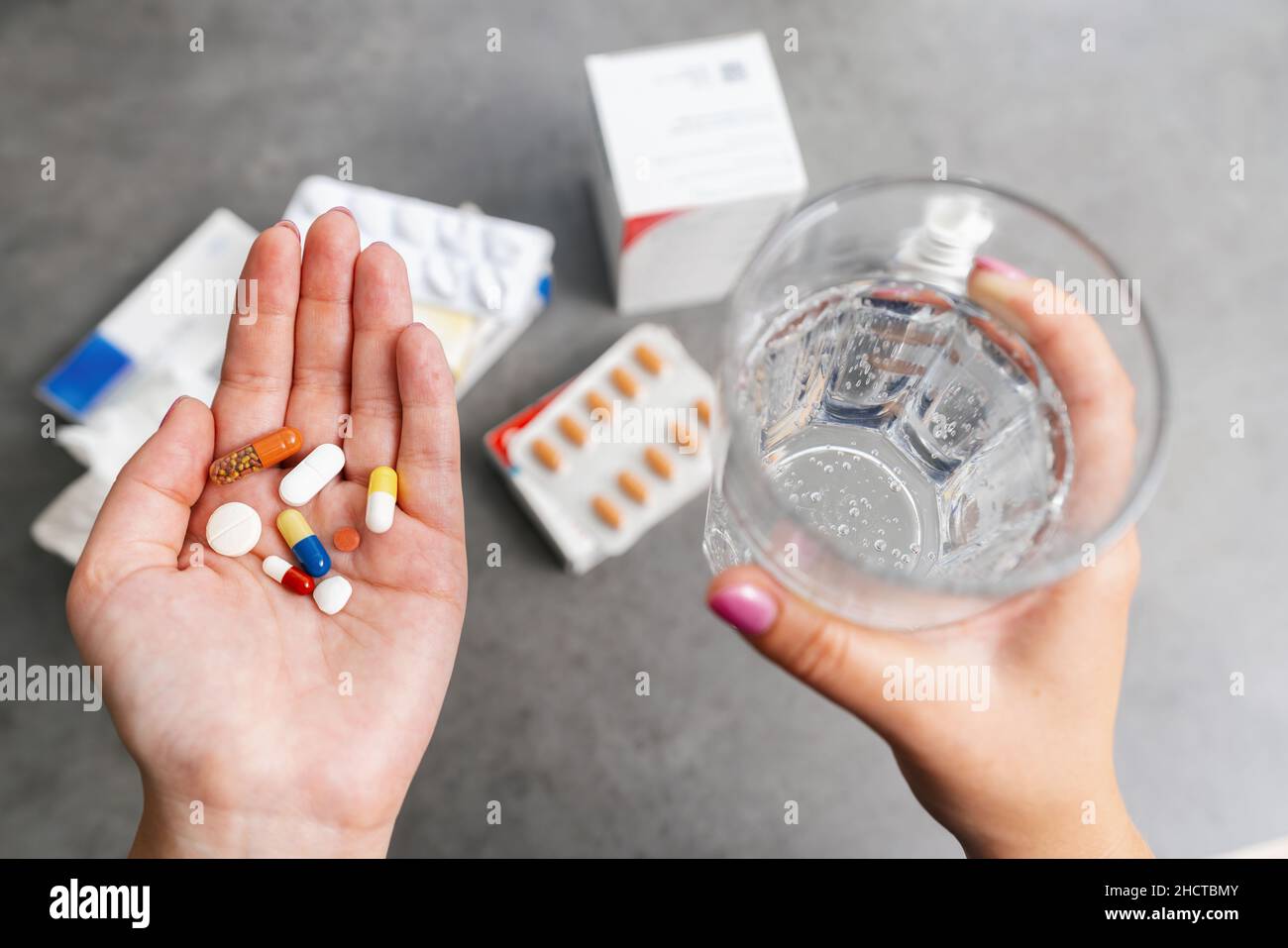 Doctor holding medicine capsule glass hi-res stock photography and ...