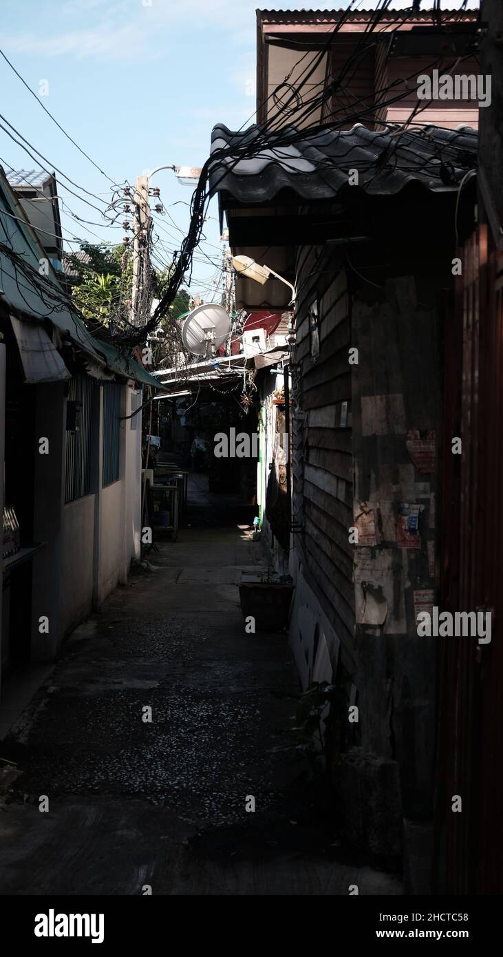 Typical unseengreen Back Alley in Bangkok Thailand Stock Photo - Alamy