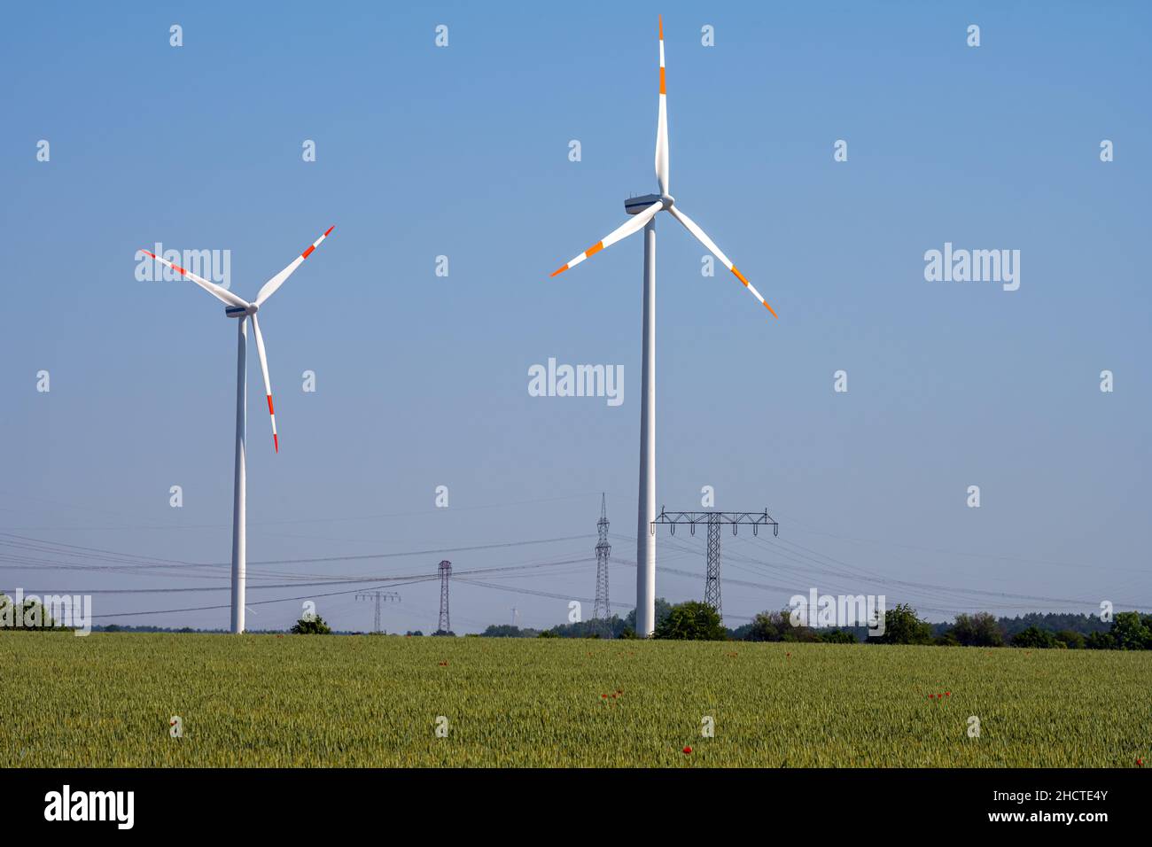 Wind turbines and overhead electric power lines seen in Germany Stock ...