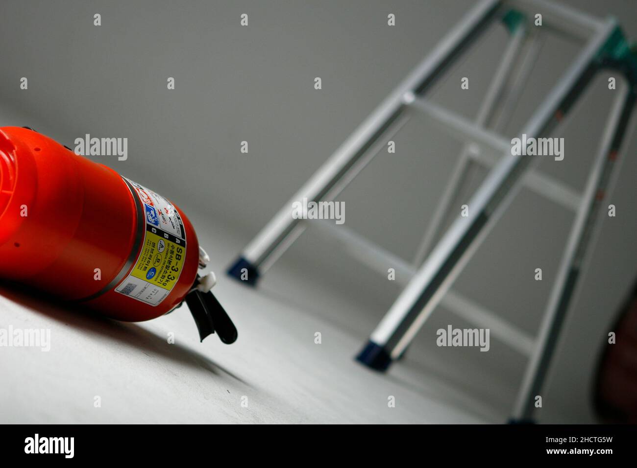 Fire Extinguisher on white background Stock Photo - Alamy