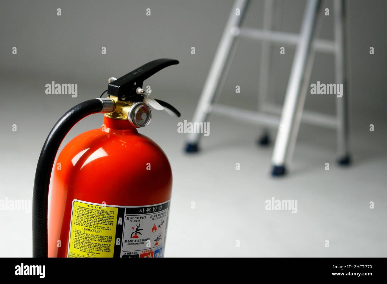 Fire Extinguisher on white background Stock Photo - Alamy