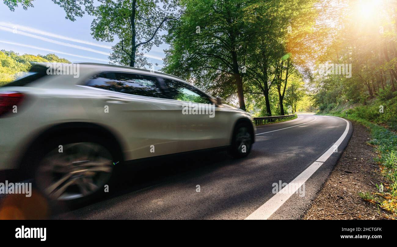 Curvy forest road hi-res stock photography and images - Alamy