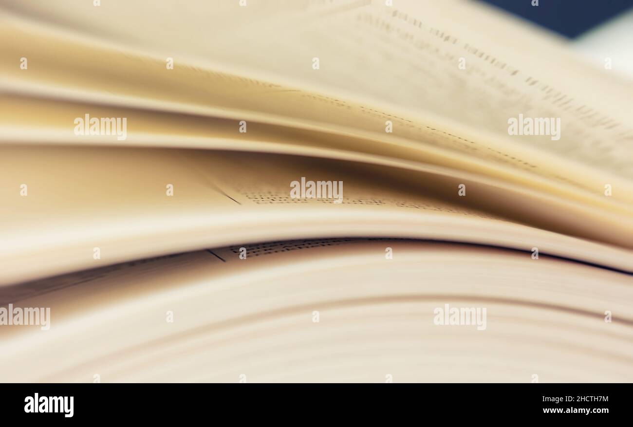 Close-up from open book pages for reading. ideal for websites and ...