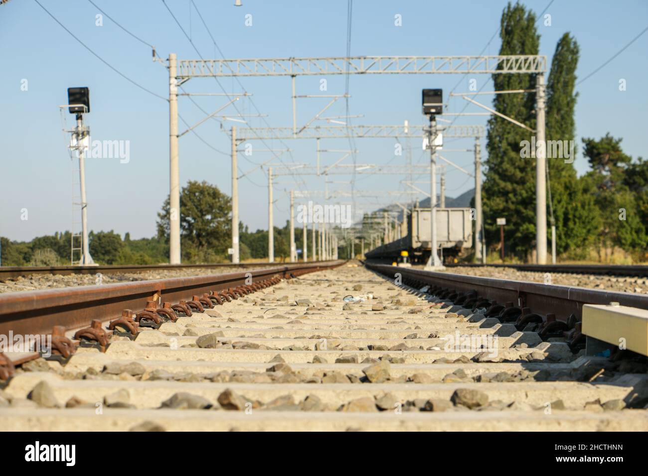 Railroad, closeup of a railroad tracks. Selective focus on the middle ...