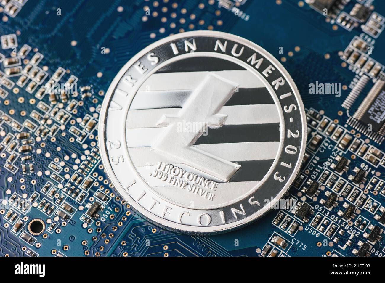 Litecoin new digital cryptocurrency on mainboard Stock Photo - Alamy