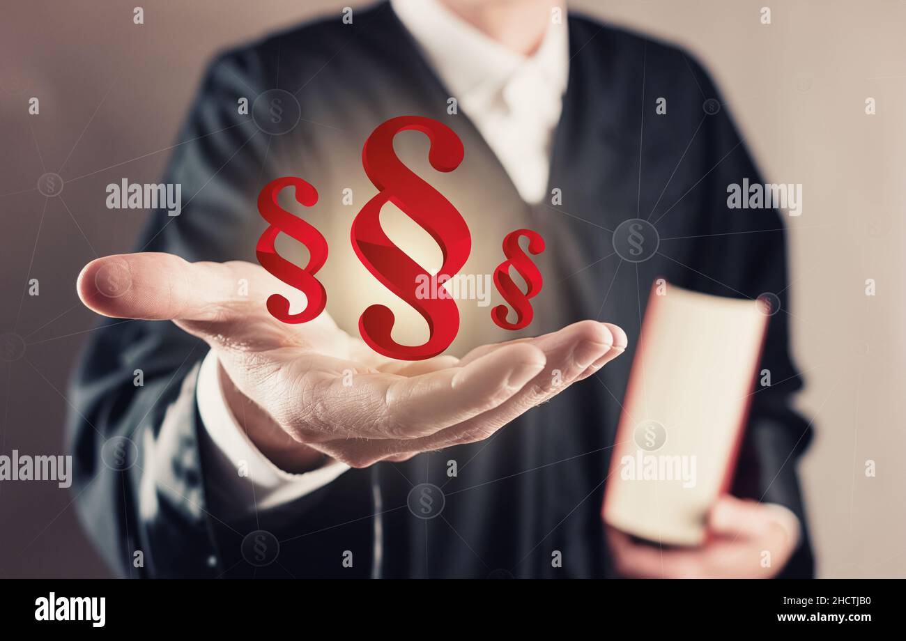 judge holding paragraph sign and book - law concept image Stock Photo ...