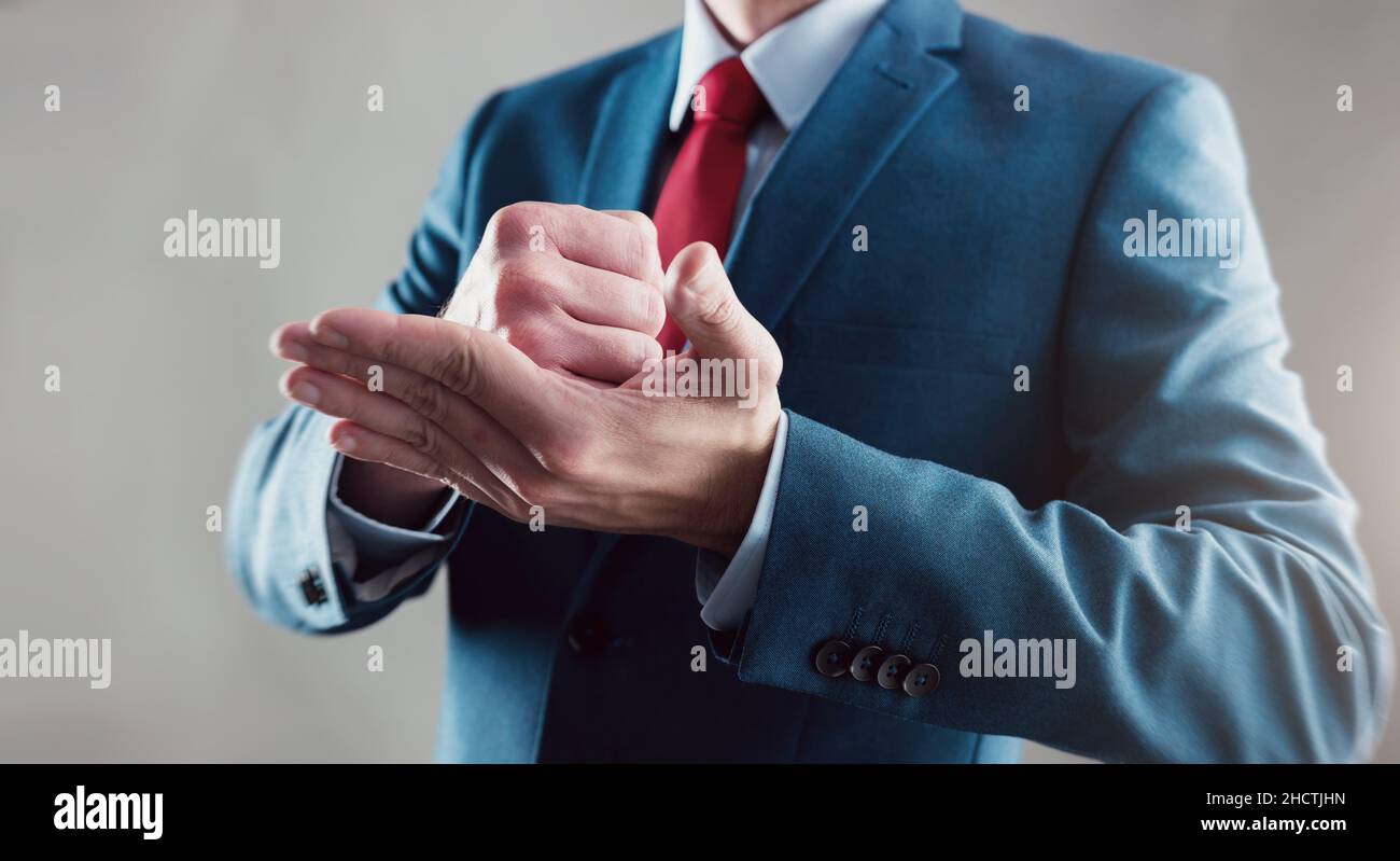 businessman celebrating success clenched fist on his hand Stock Photo ...