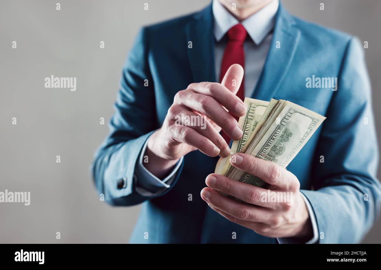 Hand gesture counting money hi-res stock photography and images - Alamy