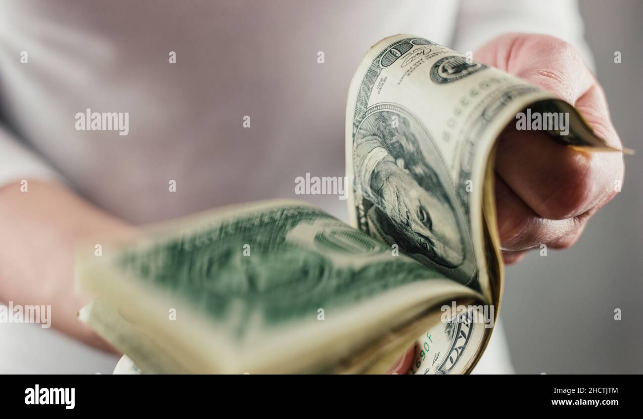 Woman hands counting money hi-res stock photography and images - Alamy
