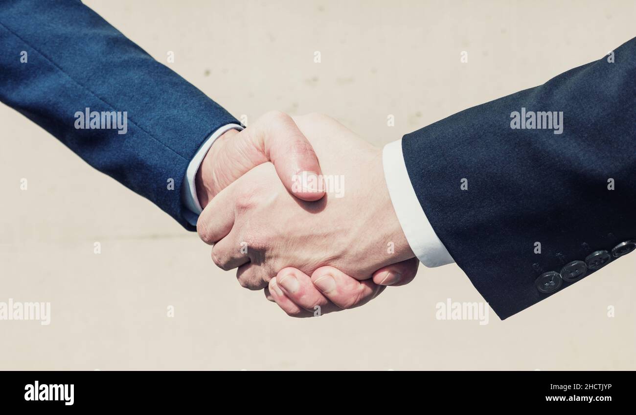 business man hand shake deal Stock Photo - Alamy