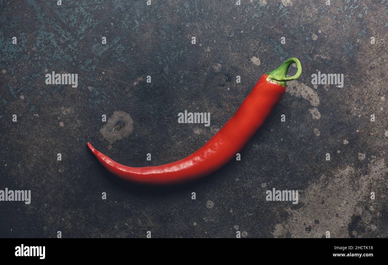 Chili. Red chili pepper on rustic background Stock Photo - Alamy