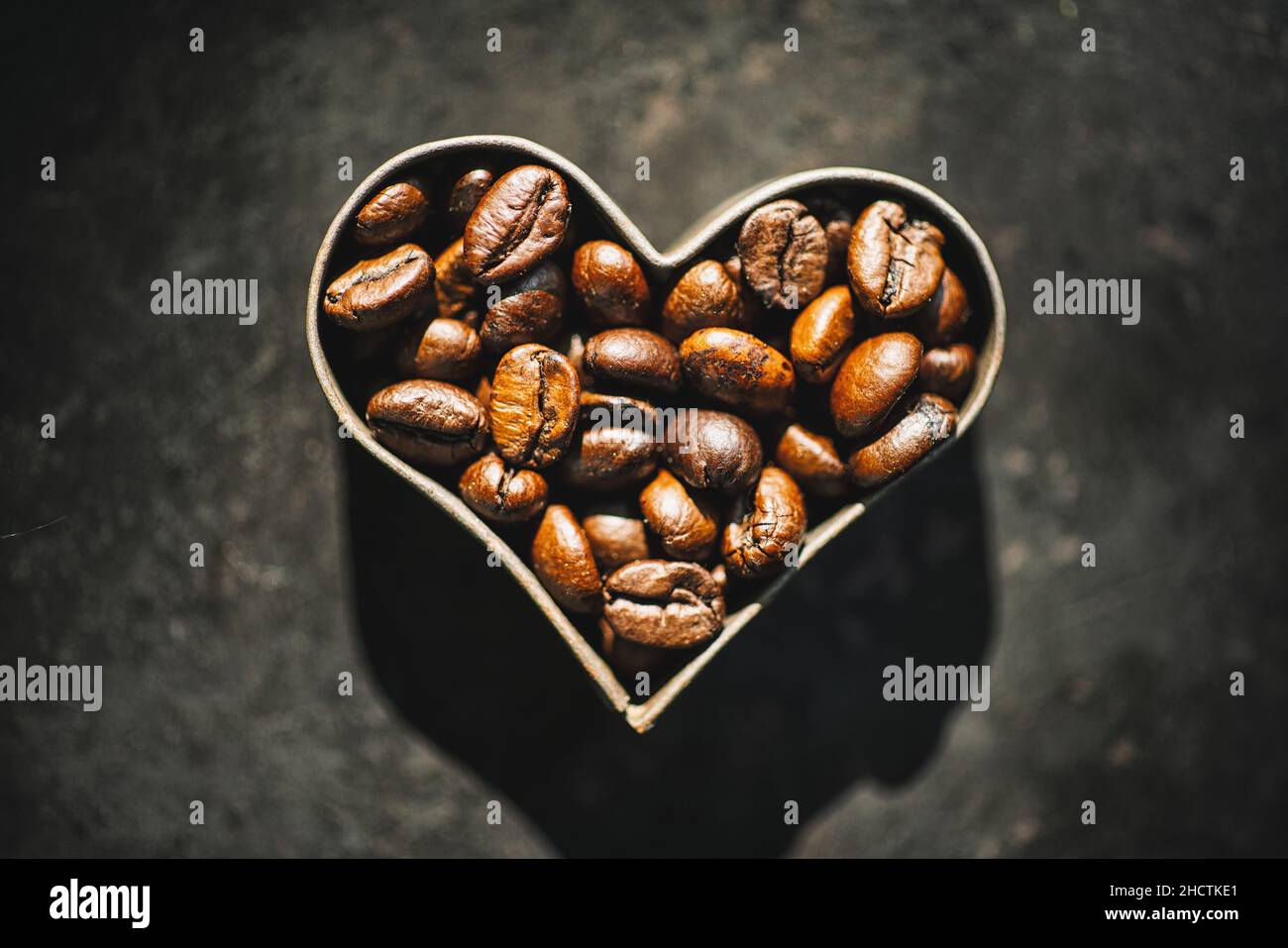 Coffee beans in a heart form Stock Photo - Alamy