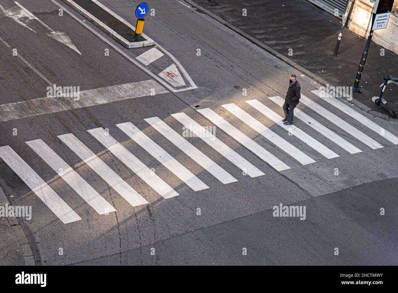 Elevated view of pedestrian crossing a crosswalk, Rome,Italy Stock ...