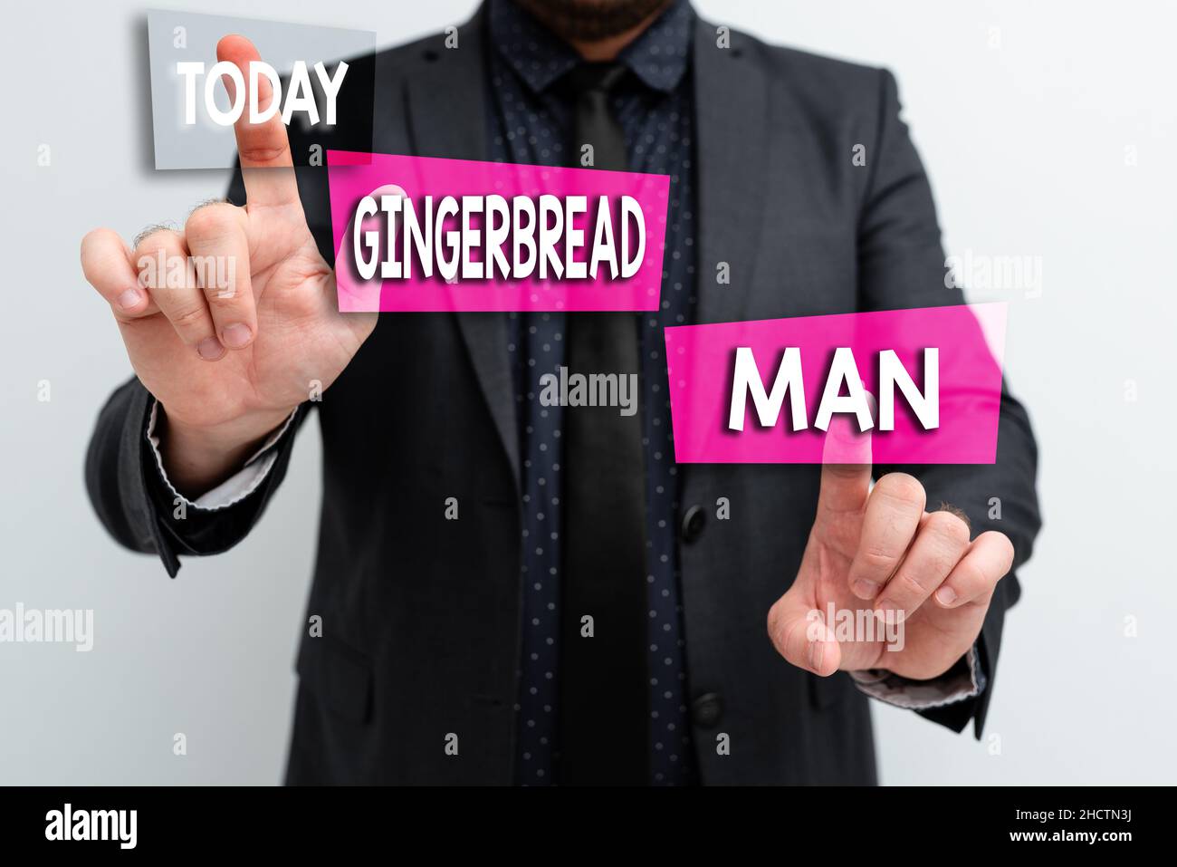 Conceptual caption Gingerbread Man. Word Written on cookie made of ...