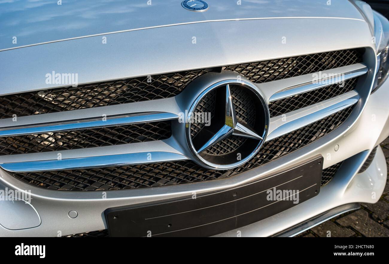 Mercedes Benz logo close up. Mercedes-Benz is a German automobile manufacturer. The brand is ...