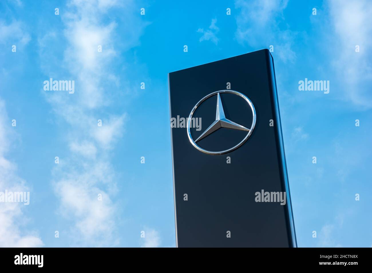 Mercedes Benz Logo with cloudy sky. Founded in 1926 is a German luxury ...