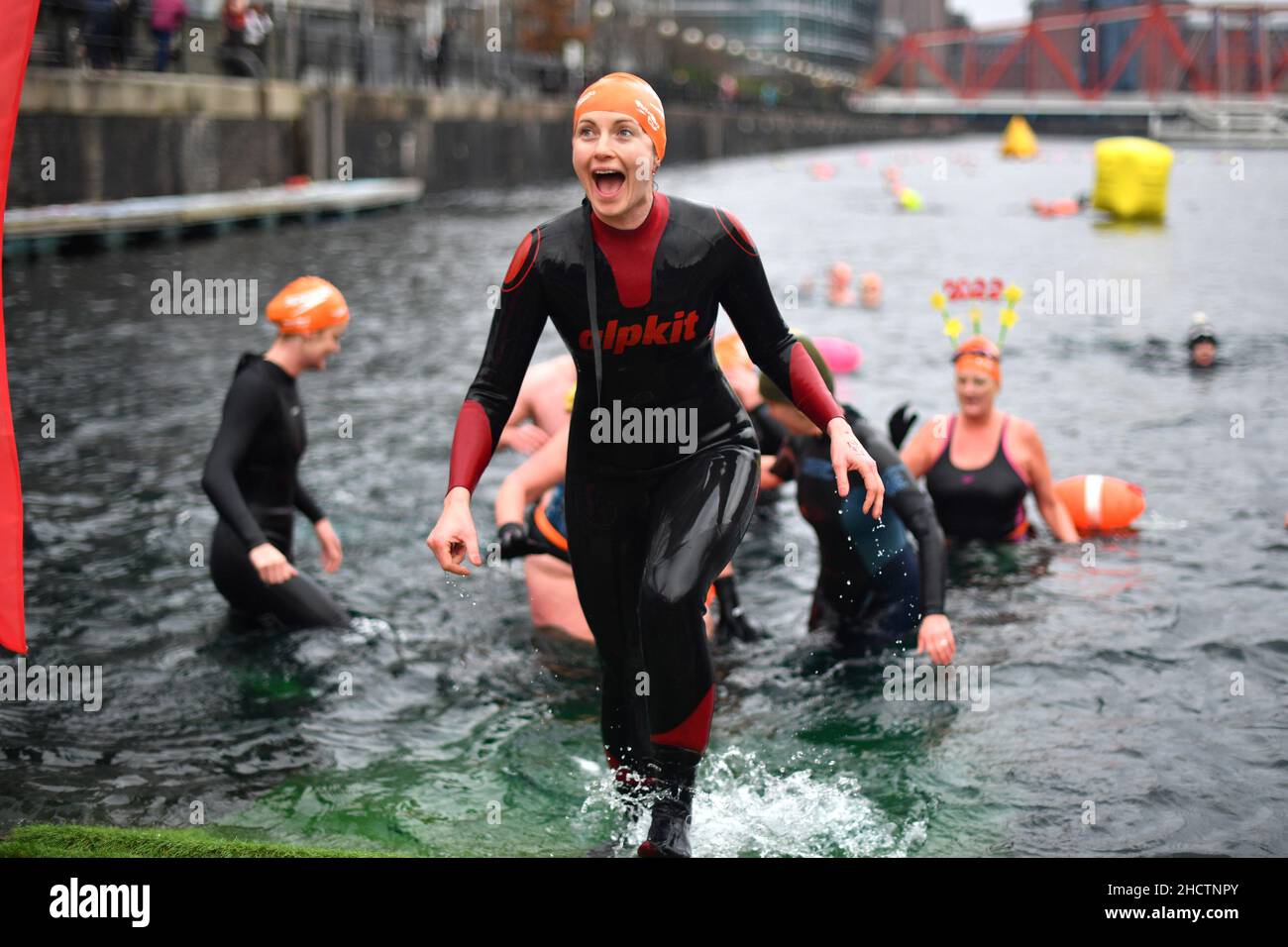 EDITORIAL USE ONLY Swimmers during the Uswim New Year's Day swim at ...