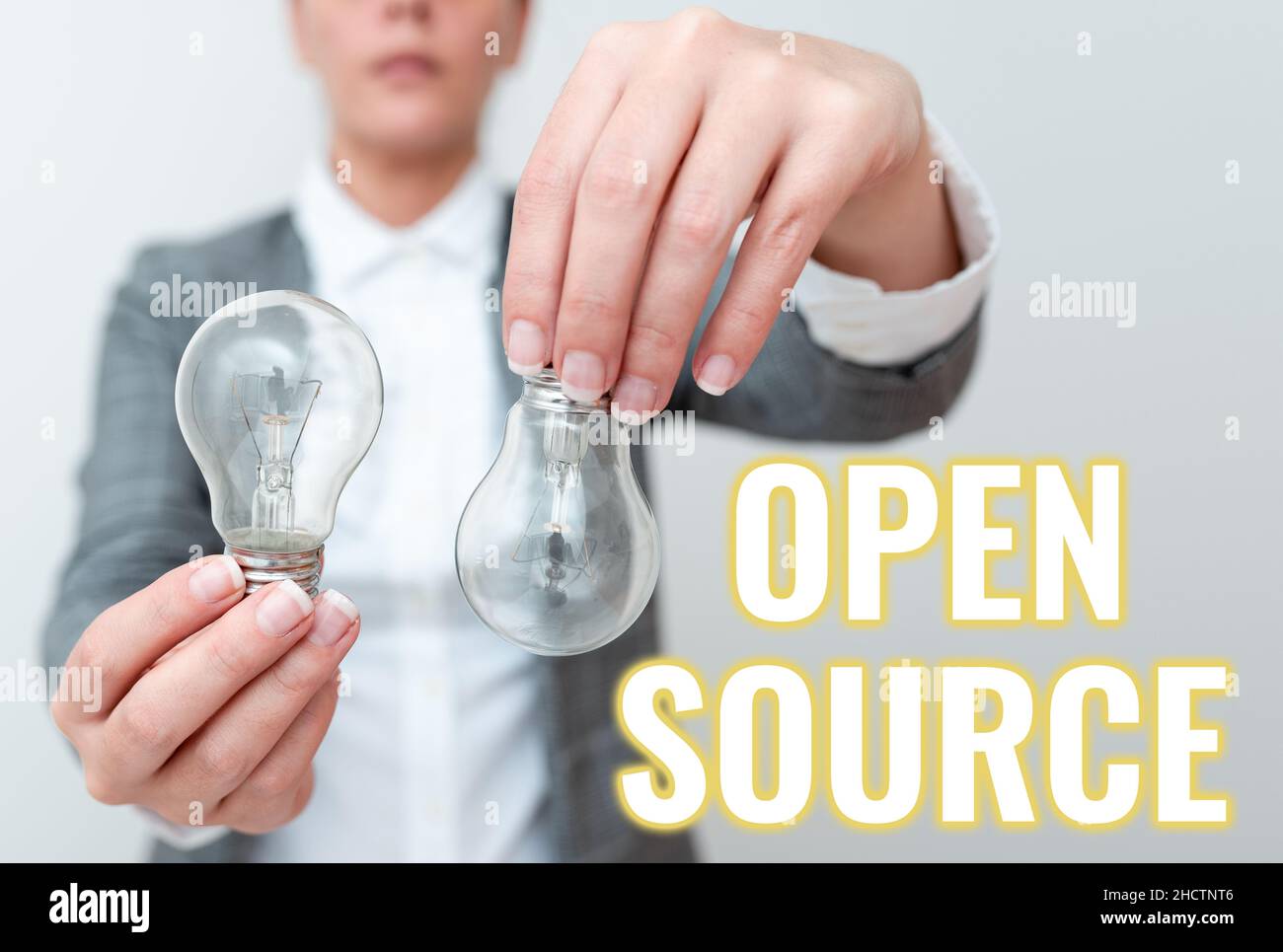 Conceptual caption Open Source. Business idea contains the source code that can be modified and ...