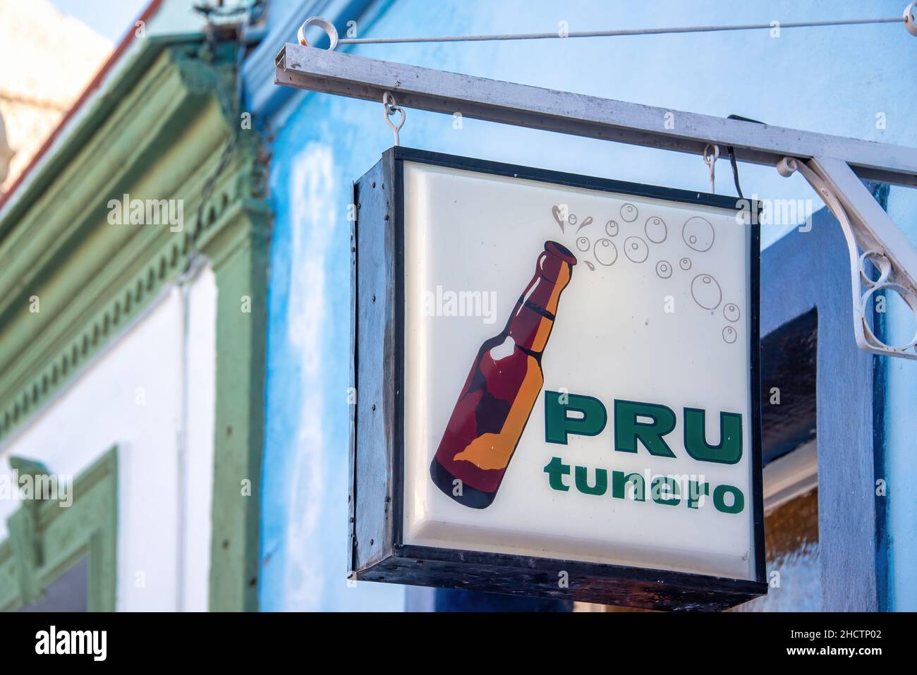 Business sign announcing 'Pru Tunero' which is a traditional drink in ...