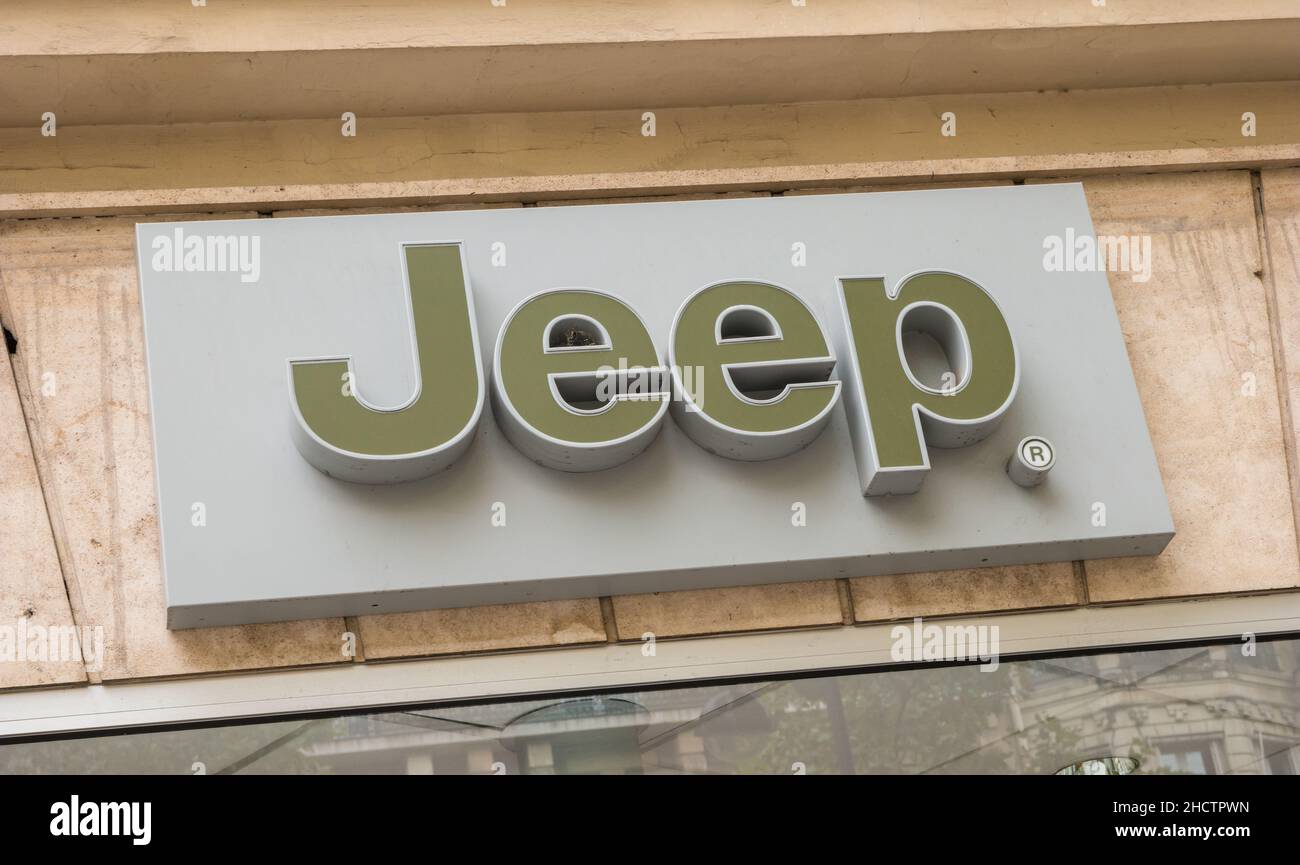Jeep logo sign on a building. Jeep is a brand of American automobiles ...