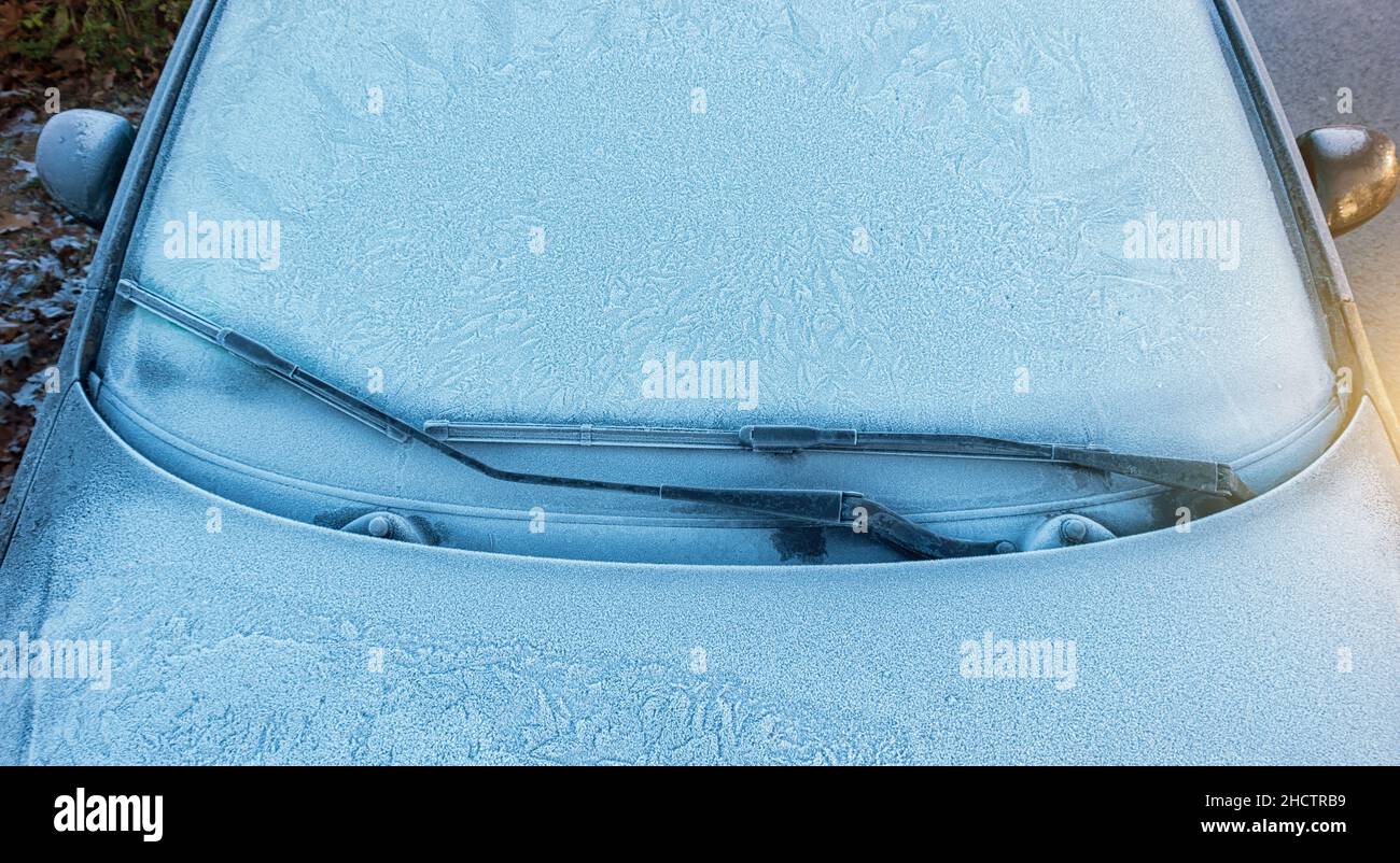 car windshield covered completely with ice and snow Stock Photo - Alamy