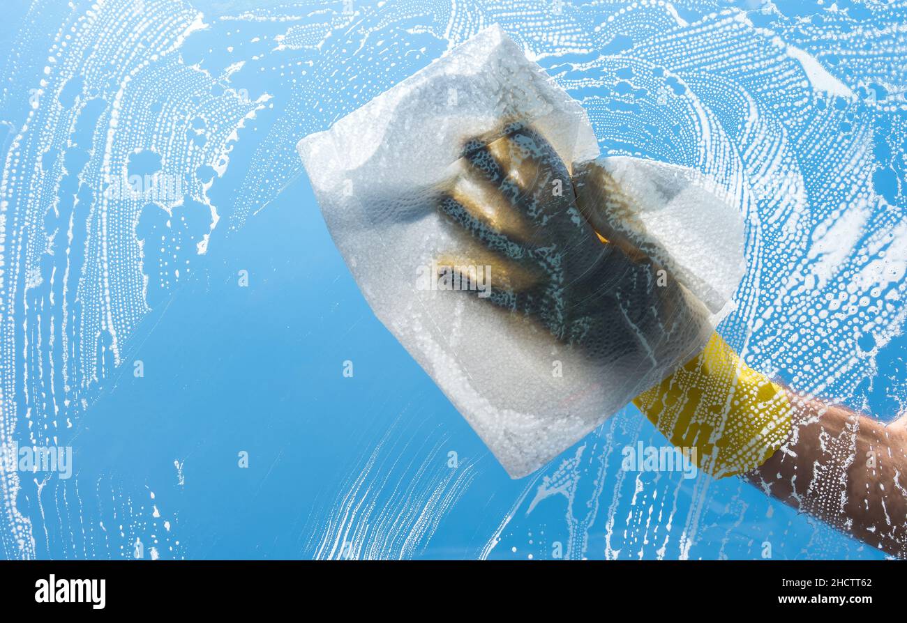 Washing dirty glass window Stock Photo - Alamy