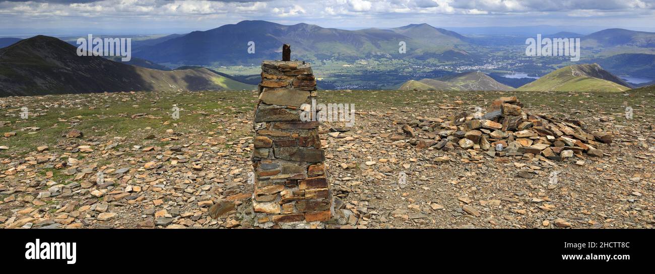 The summit cairn of Eel Crag fell above the Coledale Hause valley, Lake ...