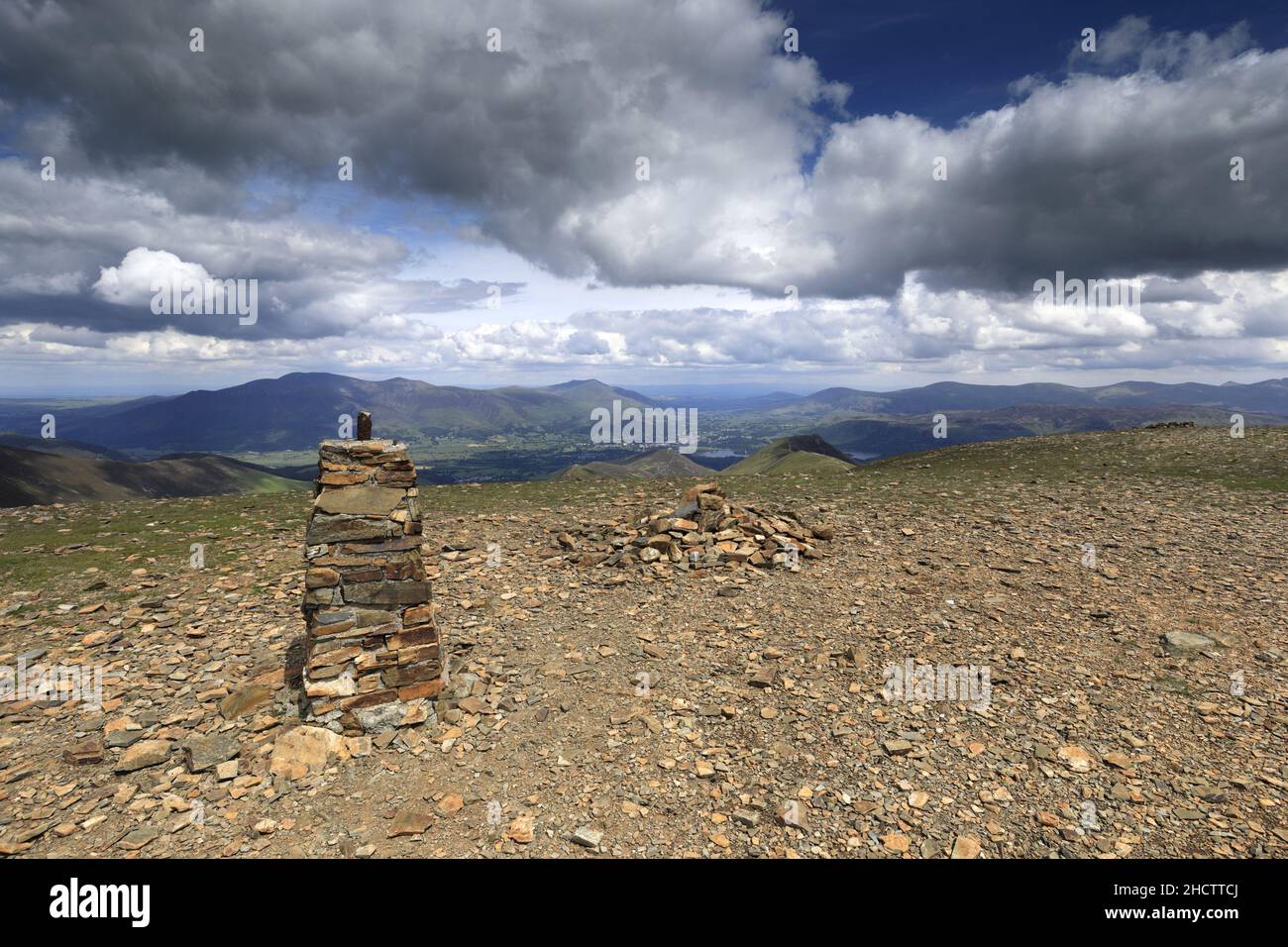 The summit cairn of Eel Crag fell above the Coledale Hause valley, Lake ...