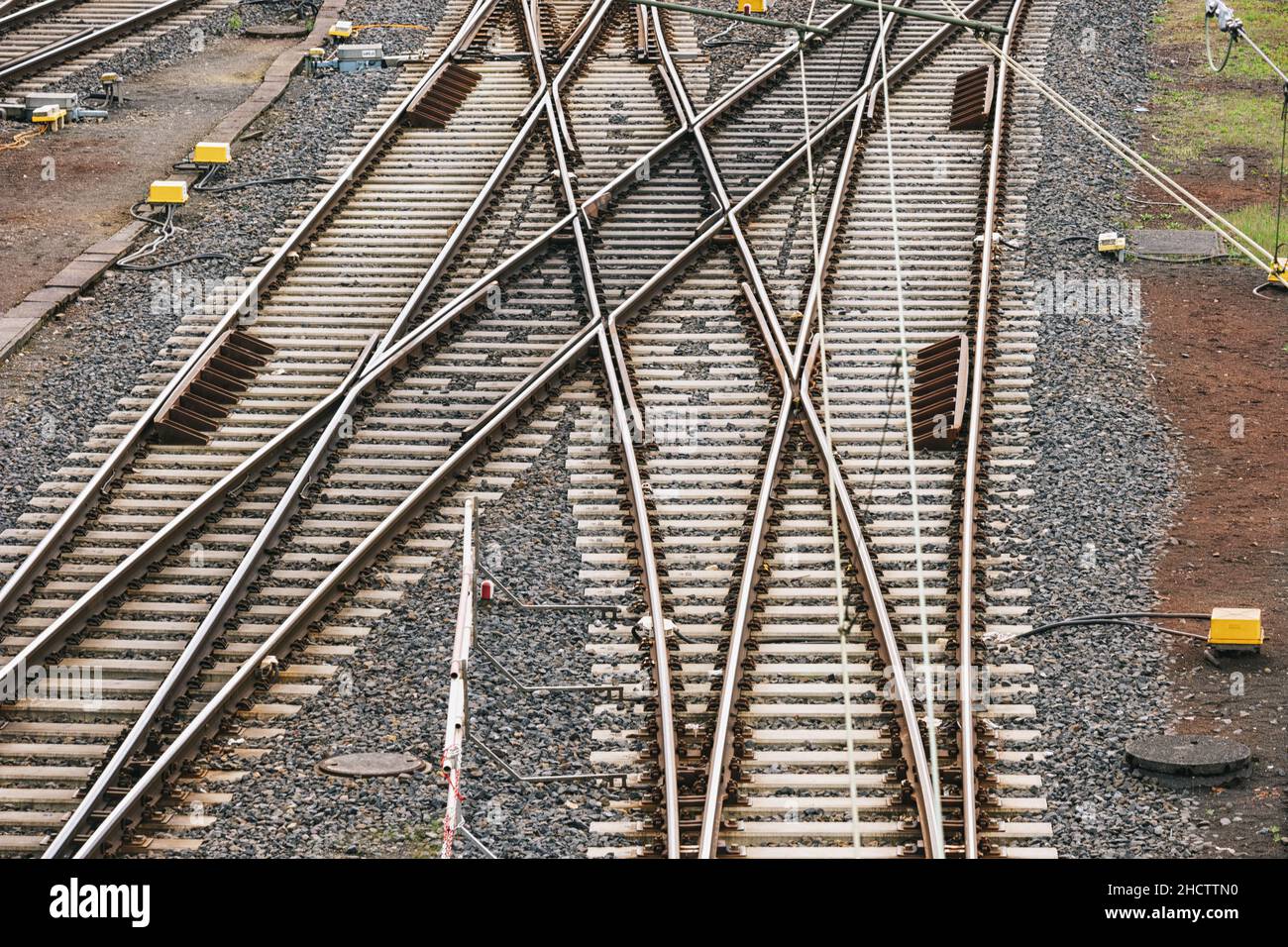 Train tracks with many options for ways forward with multiple switch point Stock Photo - Alamy