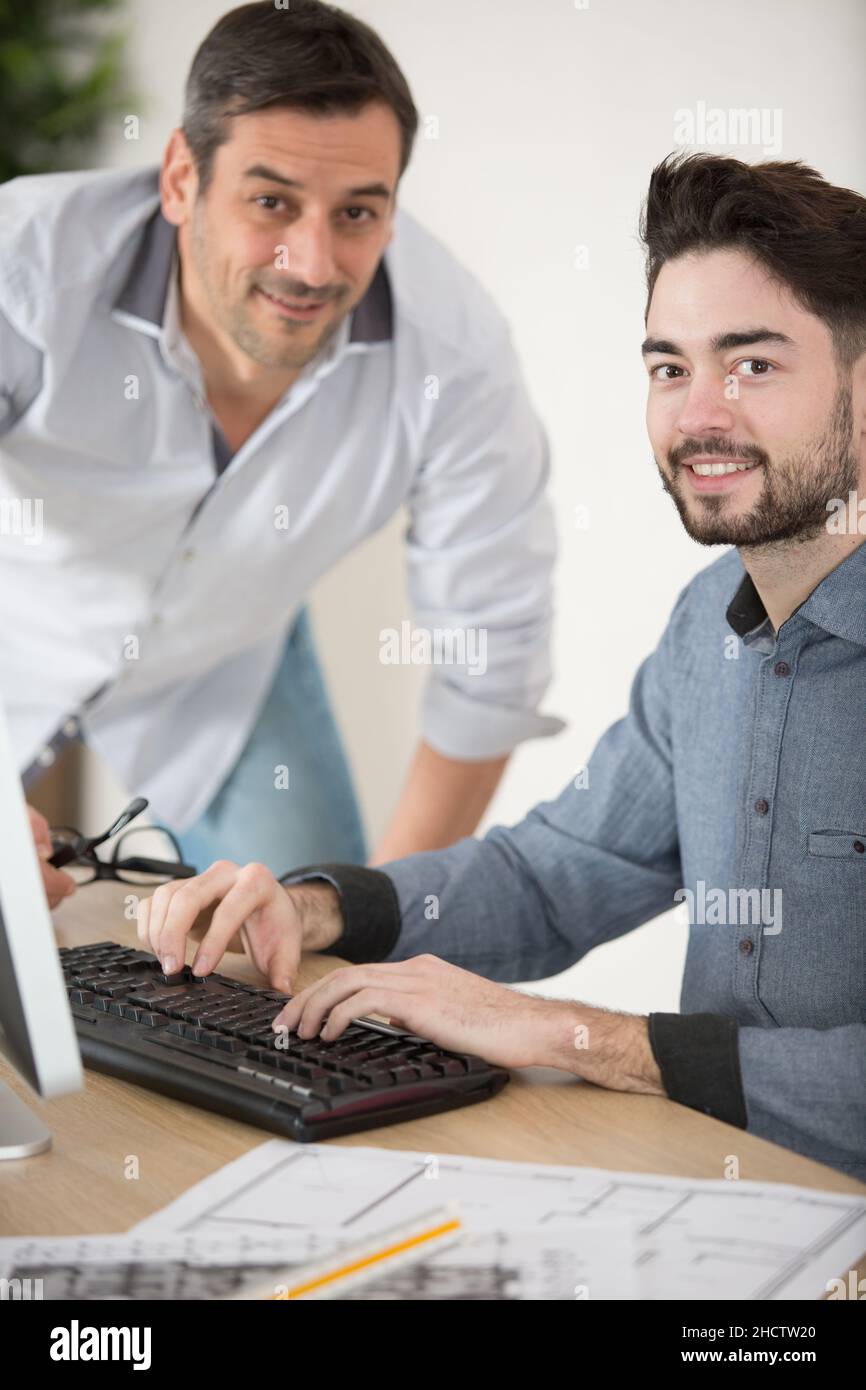 teacher and student in classroom Stock Photo - Alamy