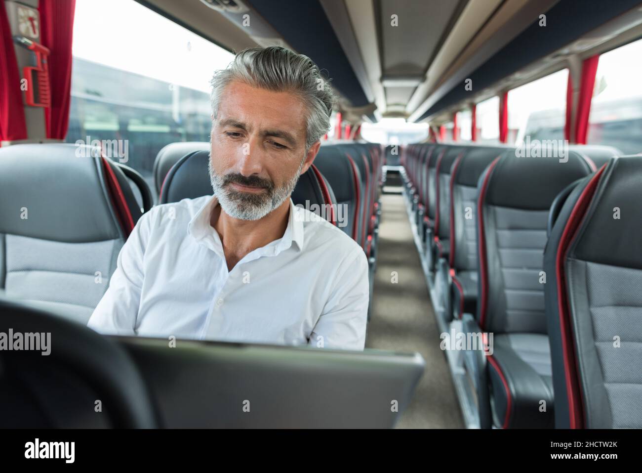 a businessman on the bus Stock Photo - Alamy