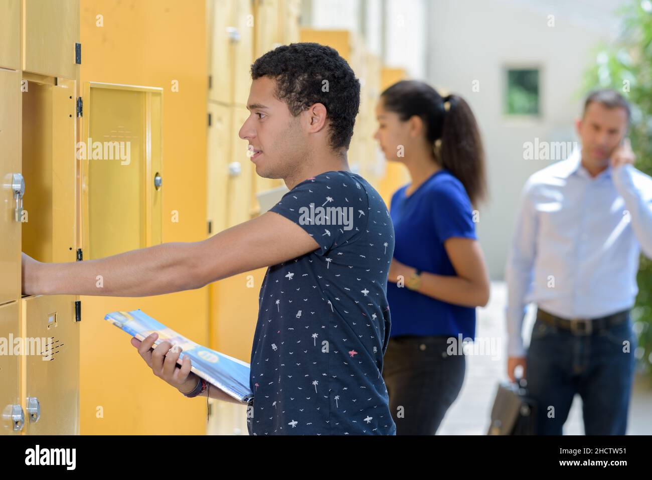young people students lockers concept Stock Photo - Alamy