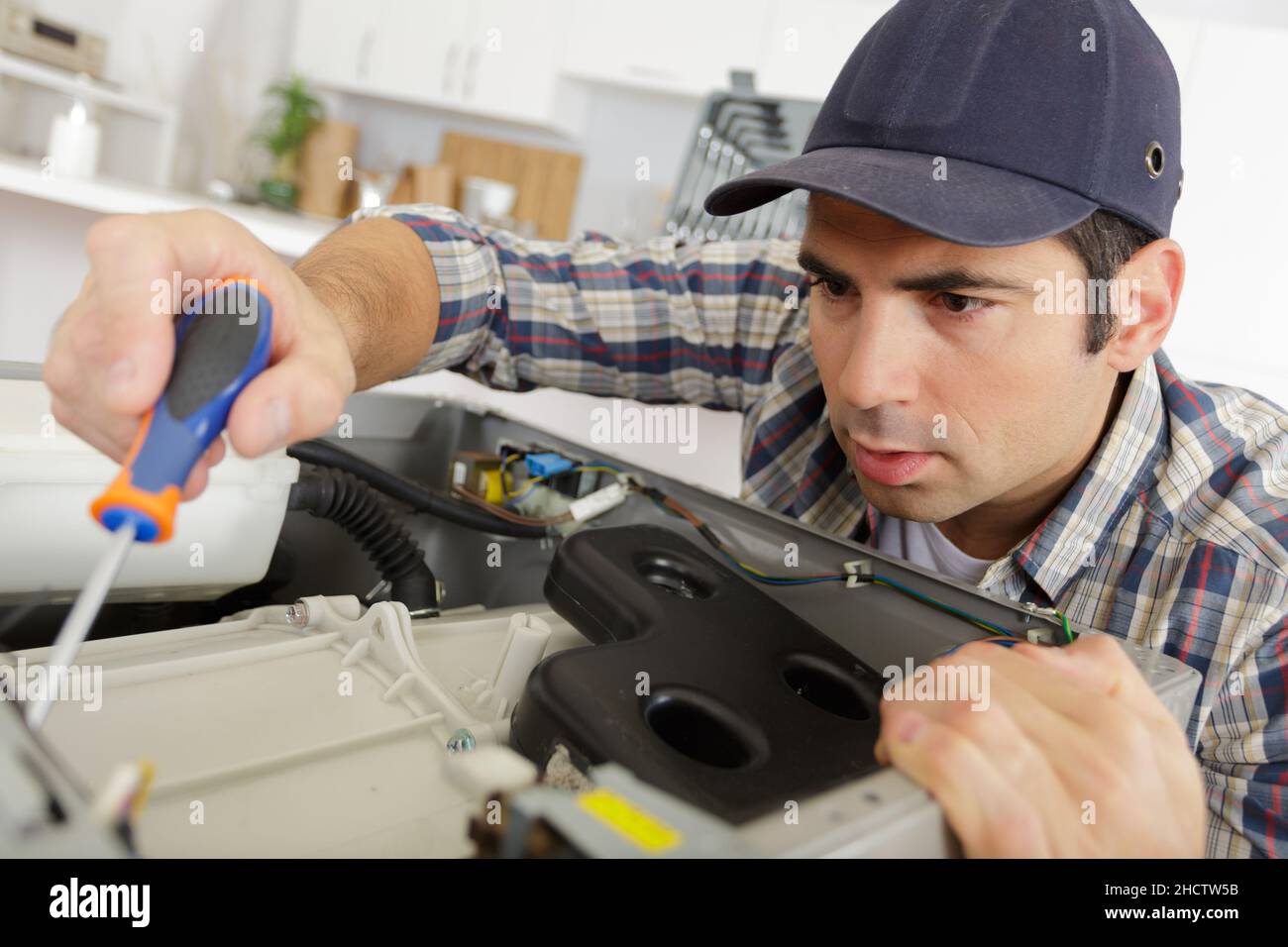 a man fixing computer motherboard Stock Photo - Alamy