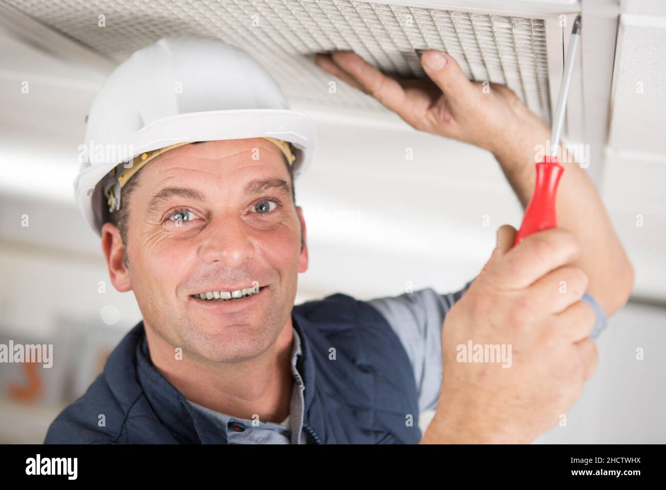 Screwing sheetrock hi-res stock photography and images - Alamy