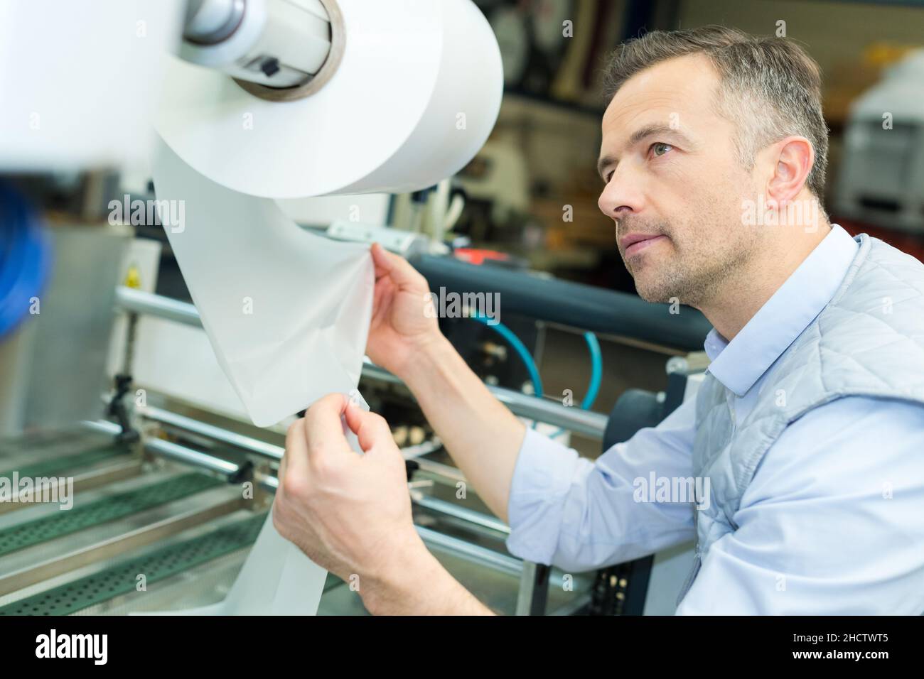 Working in huge factory hi-res stock photography and images - Alamy