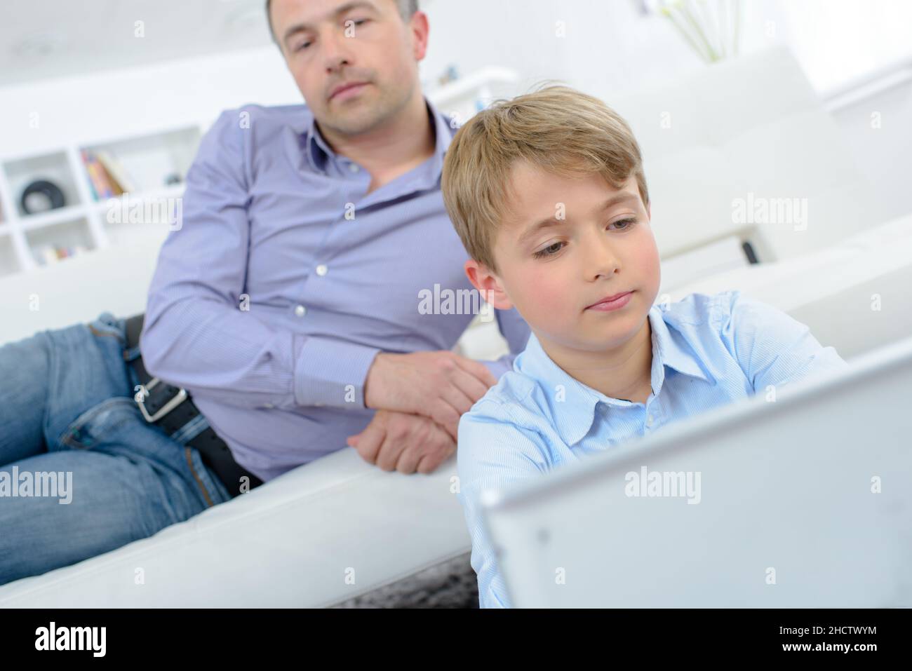 dad during the supervision of his kid Stock Photo - Alamy