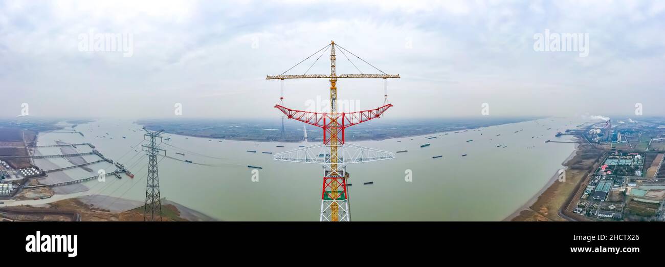 WUXI, CHINA - JANUARY 1, 2022 - Construction workers assemble the world's tallest power ...