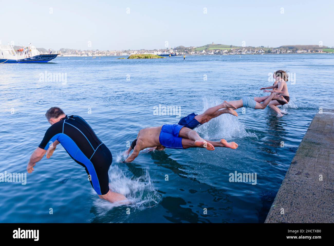 Swimmer underwater after the jump hi-res stock photography and images ...