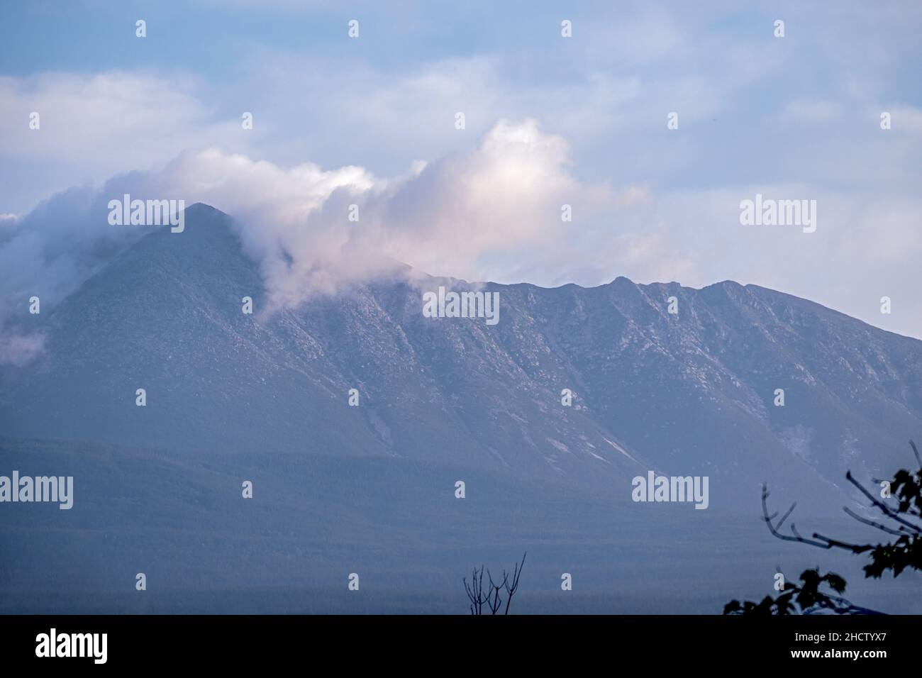 Mount Katahdin's summit draped with clouds at daybreak Stock Photo - Alamy