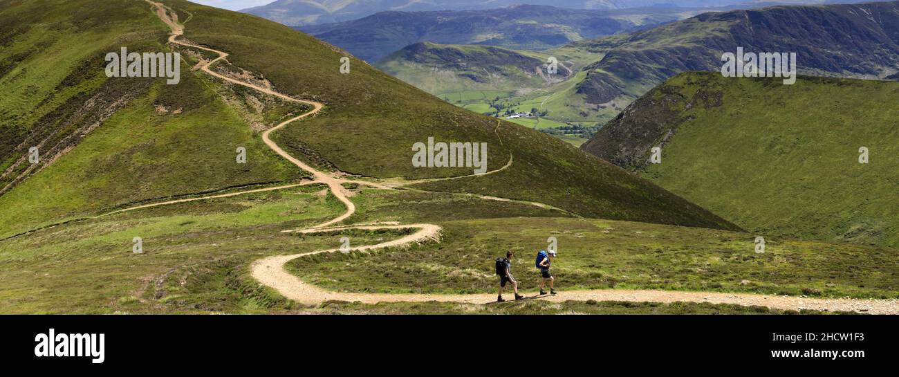 Walkers on the zigzag footpath up to Sail fell above the Coledale Hause ...
