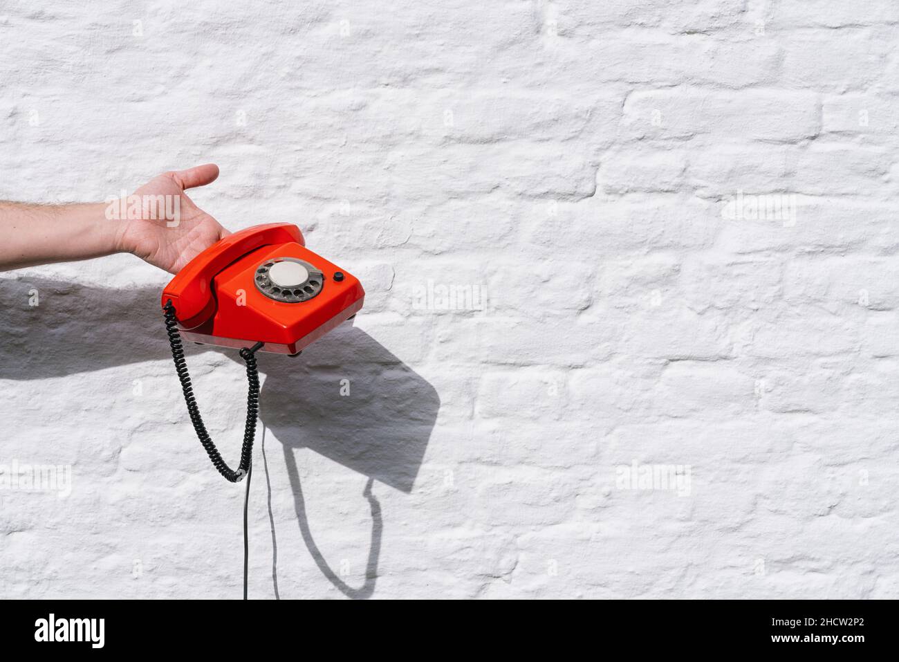 Telephone receiver dangling hi-res stock photography and images - Alamy