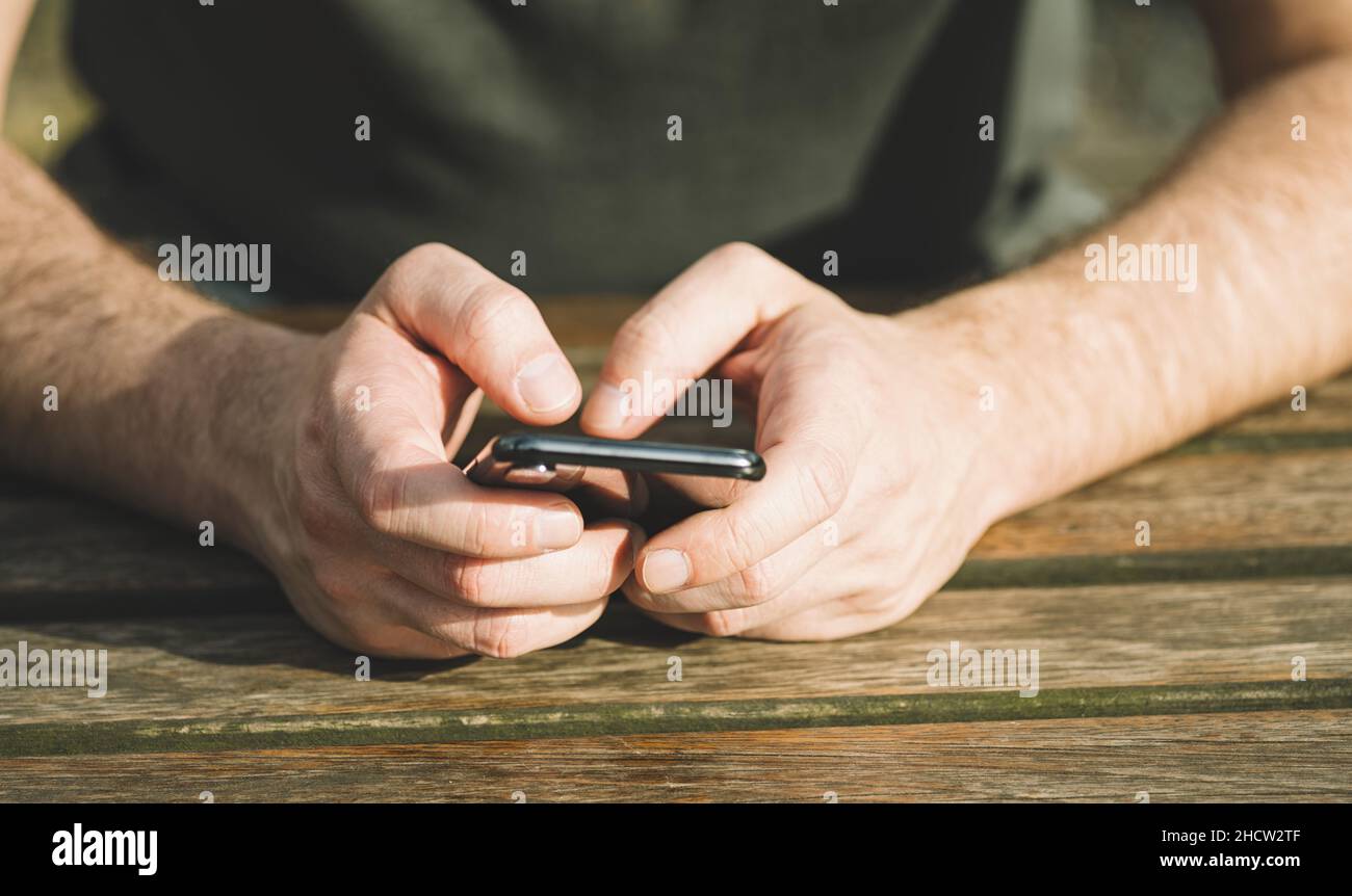 People typing on device hi-res stock photography and images - Alamy