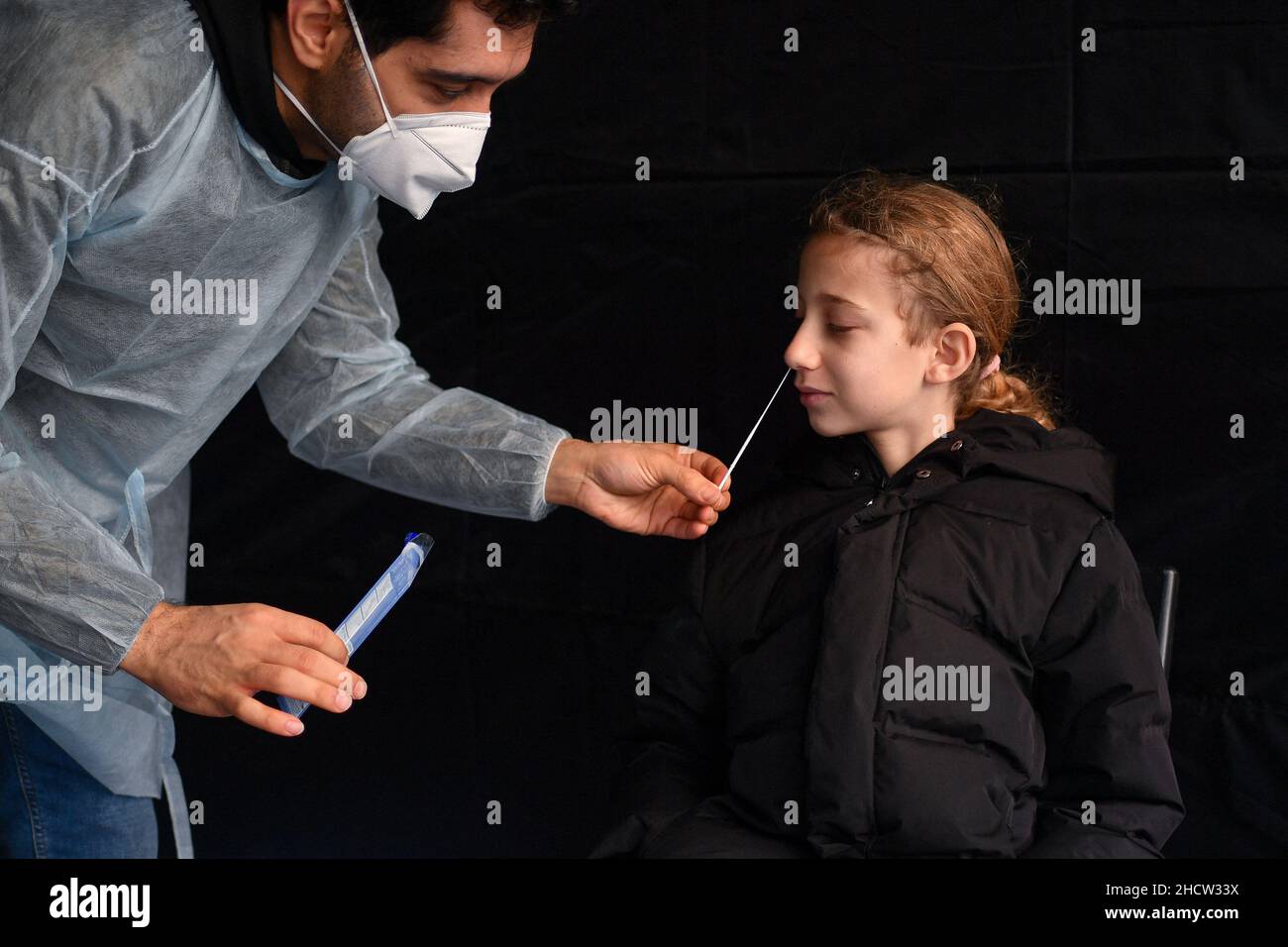 Paris, France. 01st Jan, 2022. People queuing up at PCR testing tents ...