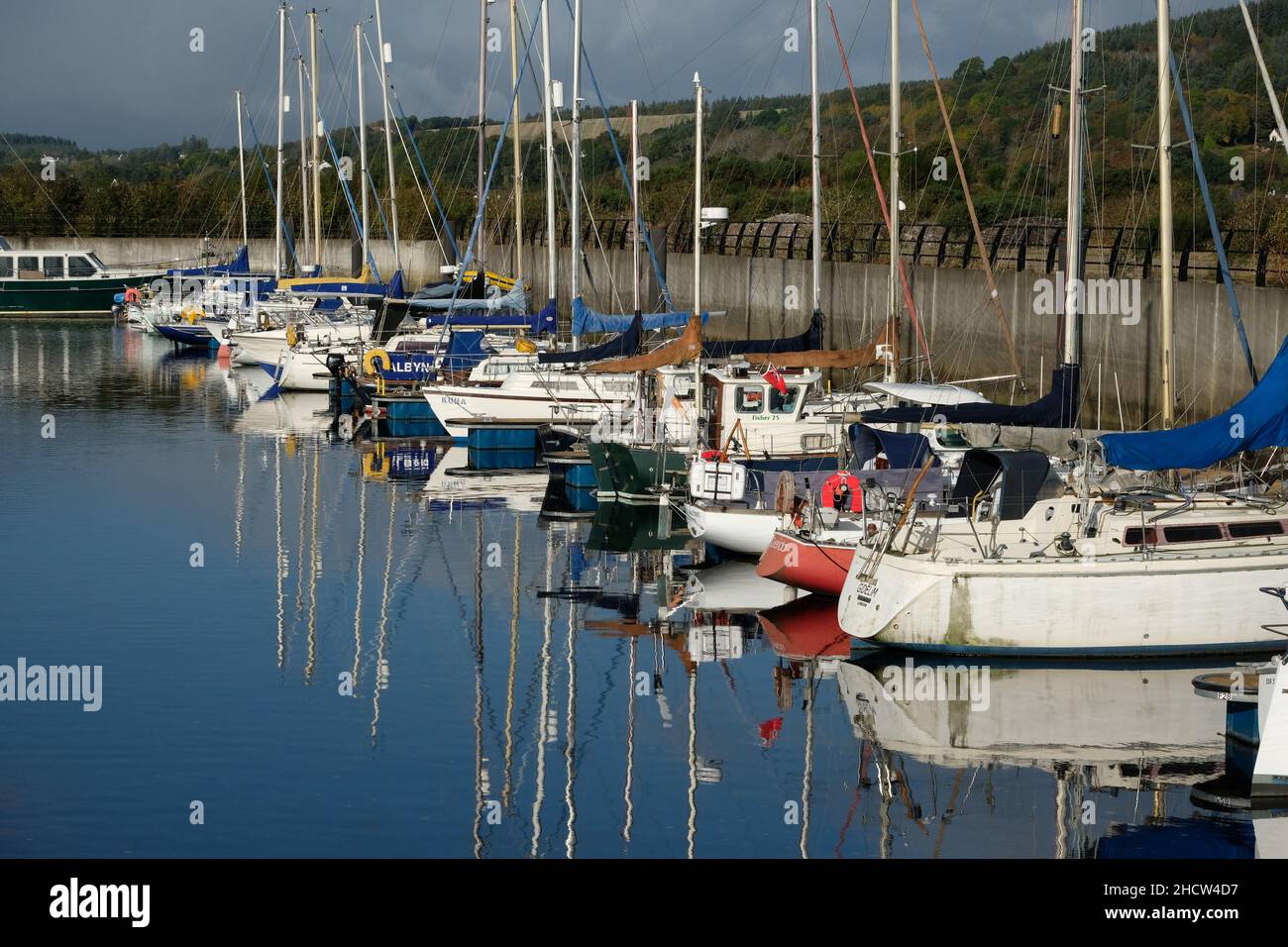 A colour photograph of boats moored at Inverness Marina situated close ...
