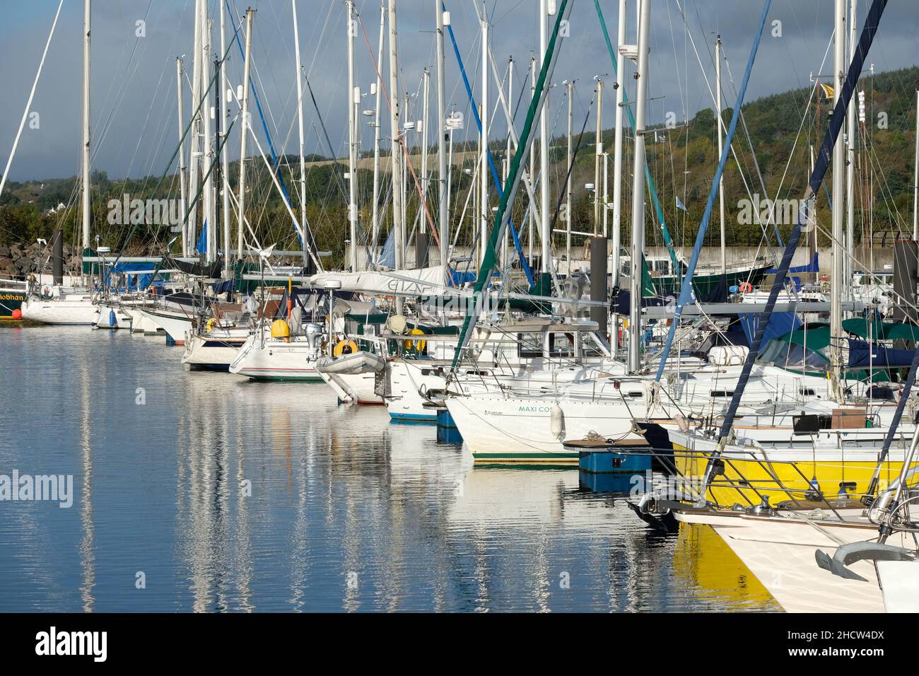 A colour photograph of boats moored at Inverness Marina situated close ...