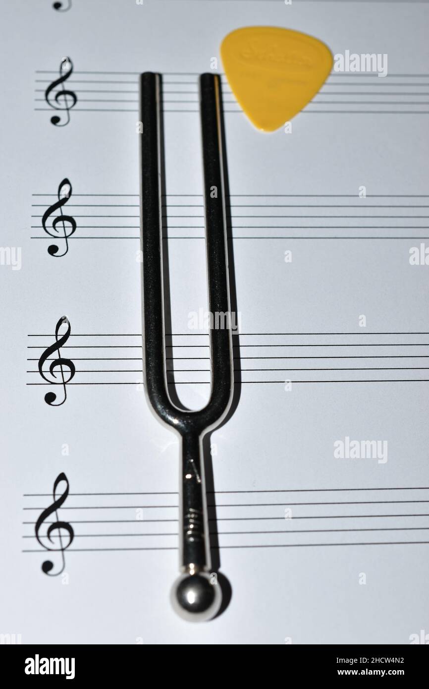 Tuning fork on sheet music hi-res stock photography and images - Alamy