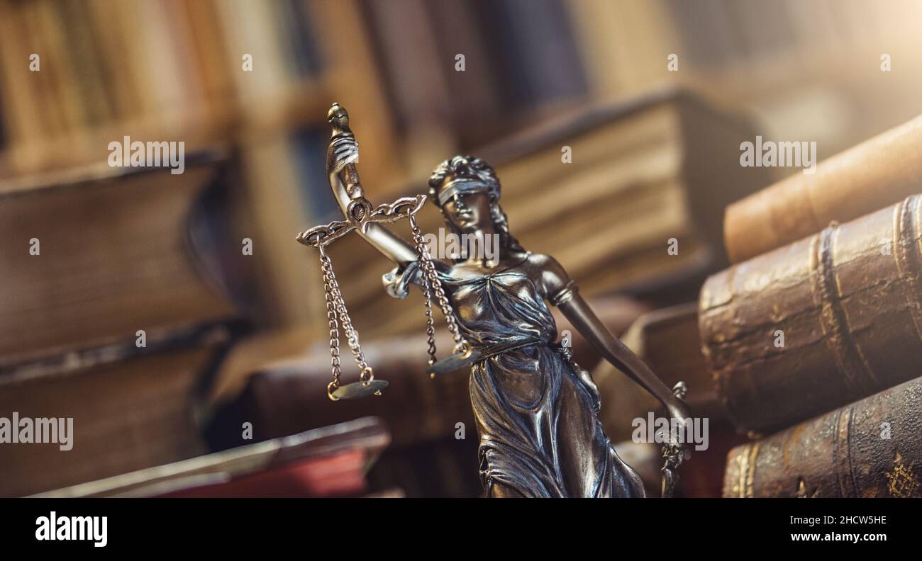 Lady Justice Statue in a courtroom Stock Photo - Alamy