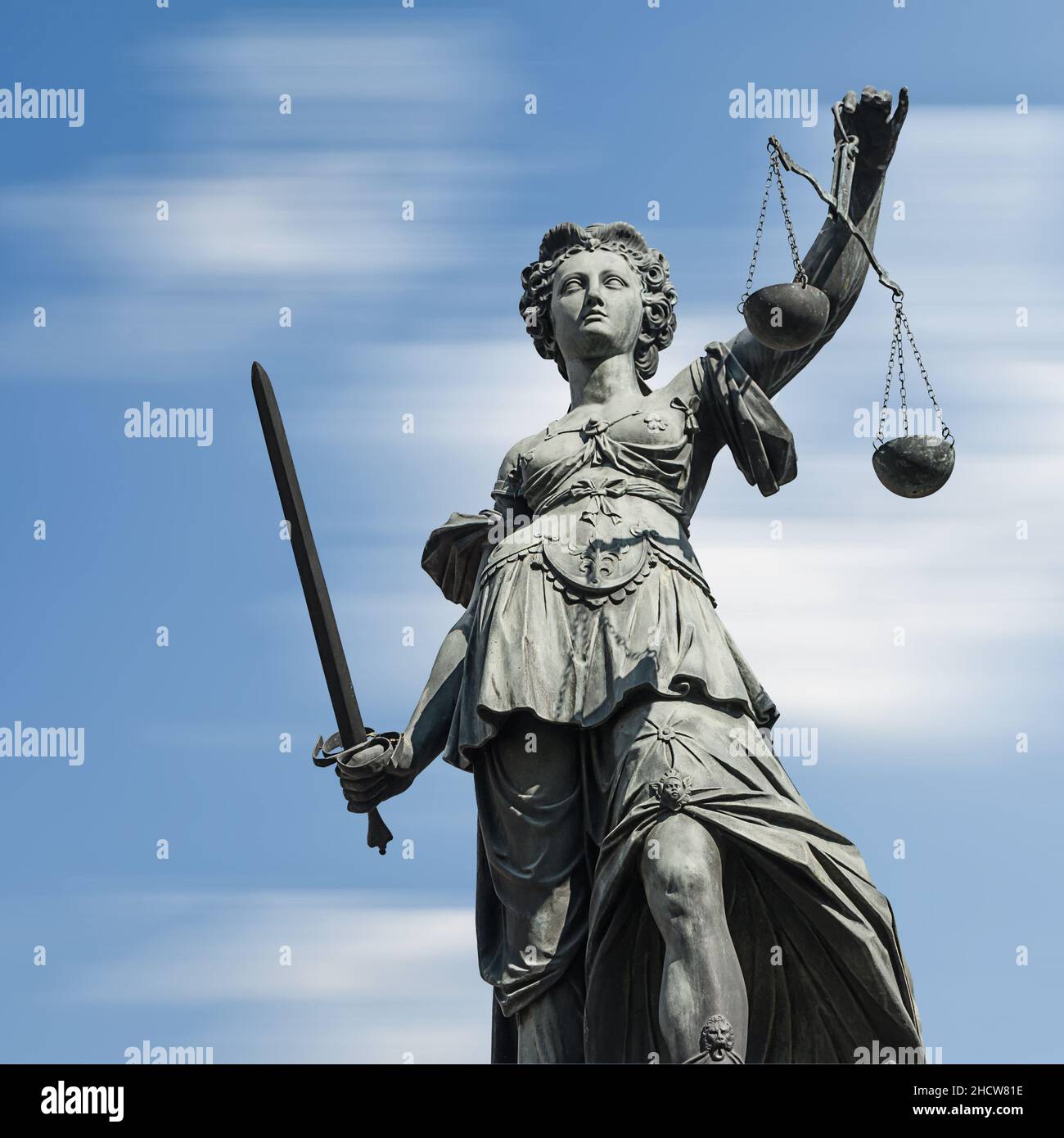 Statue of justice (Justitia) against blue sky Stock Photo - Alamy
