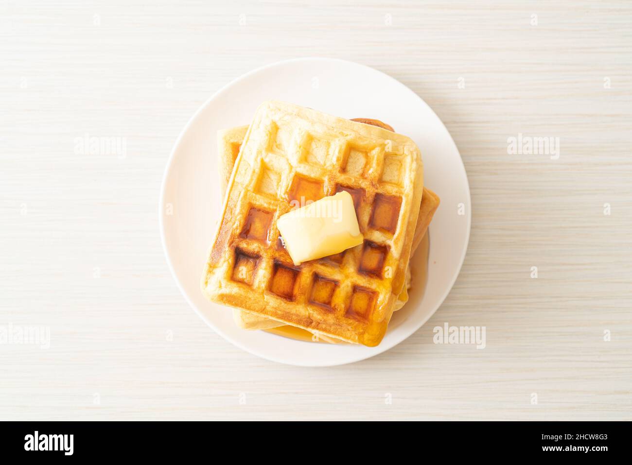 homemade waffle stack with butter and honey or maple syrup Stock Photo ...