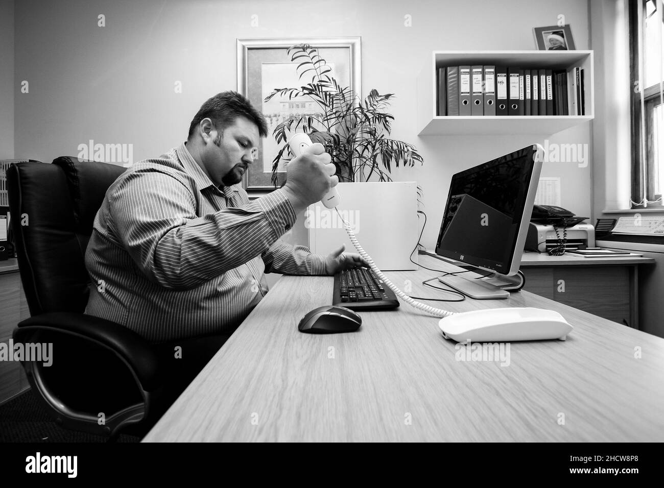 Frustrated man at computer Black and White Stock Photos & Images - Alamy